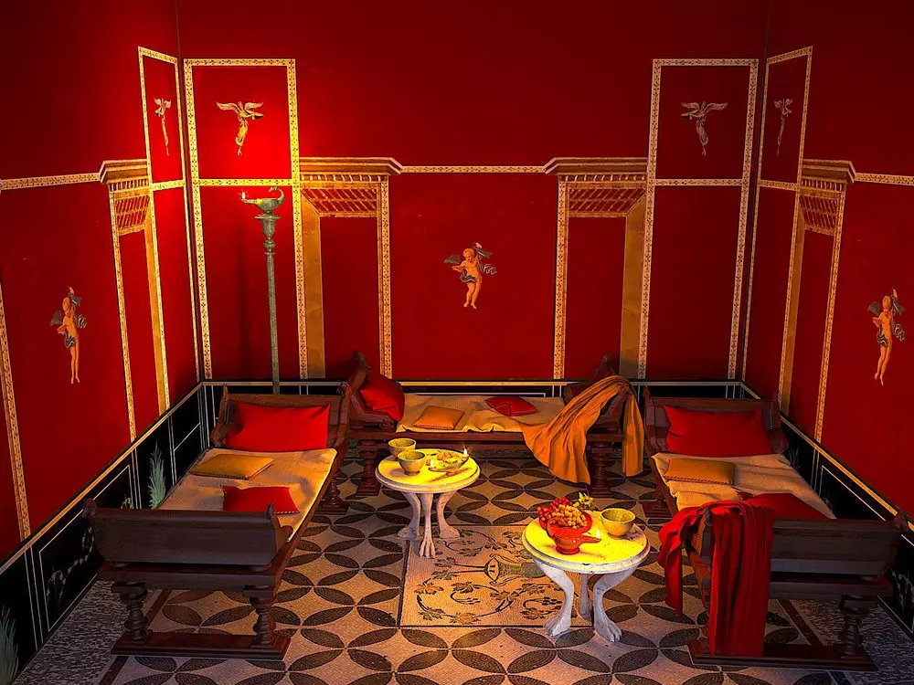 Piros falú szoba fehér és fekete csempézett mozaikokkal, a padló közepén egy nagy díszdarabbal, amely egy vázából kinyúló szőlőt ábrázol, és három alacsony ággyal a falak mellett