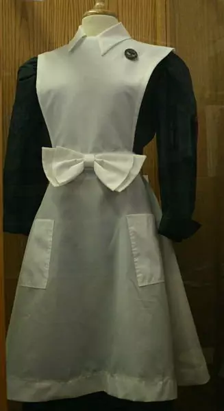 El clásico uniforme de Harvey Girl.