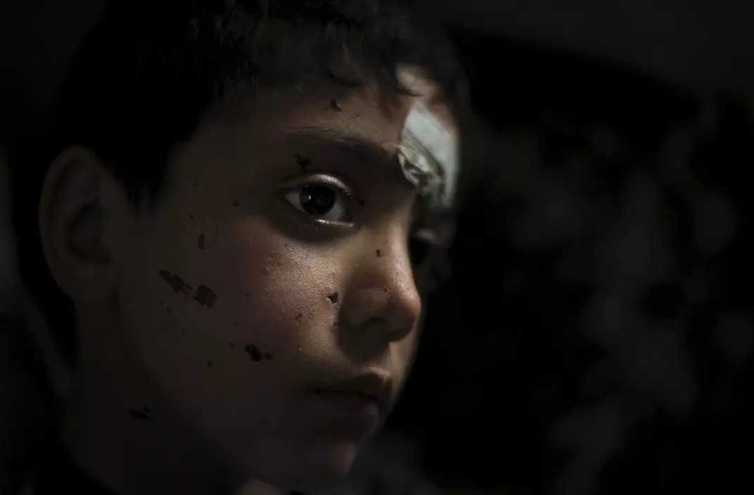 सीरिया के बच्चों की ये तस्वीरें मध्य पूर्व में मानवीय संकट का सामना करती हैं 51650_3