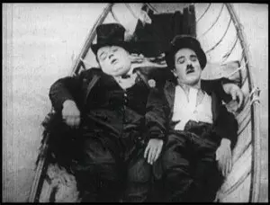 Arbuckle a Charlie Chaplin vo filme The Rounders.