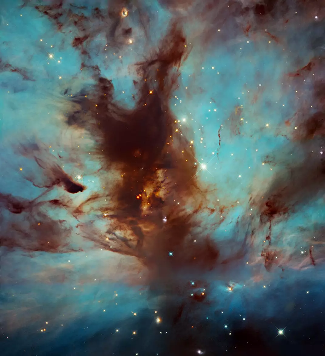 Flame Nebula ထဲမှာ ဖုန်မှုန့်တွေ ဝေ့ဝဲနေတယ်။